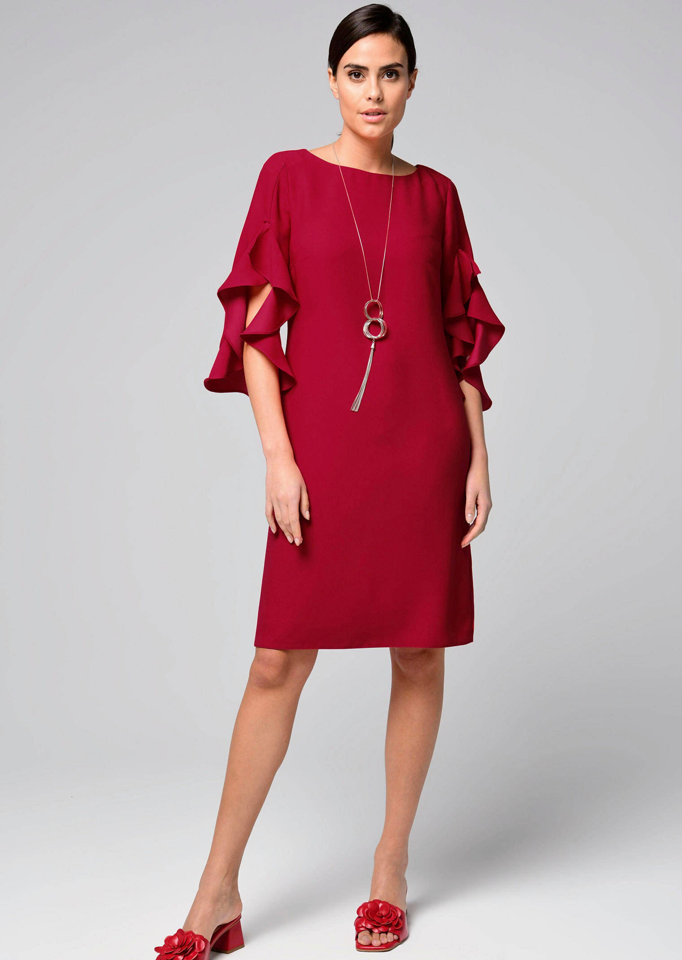 Dress in red | MADELEINE Fashion