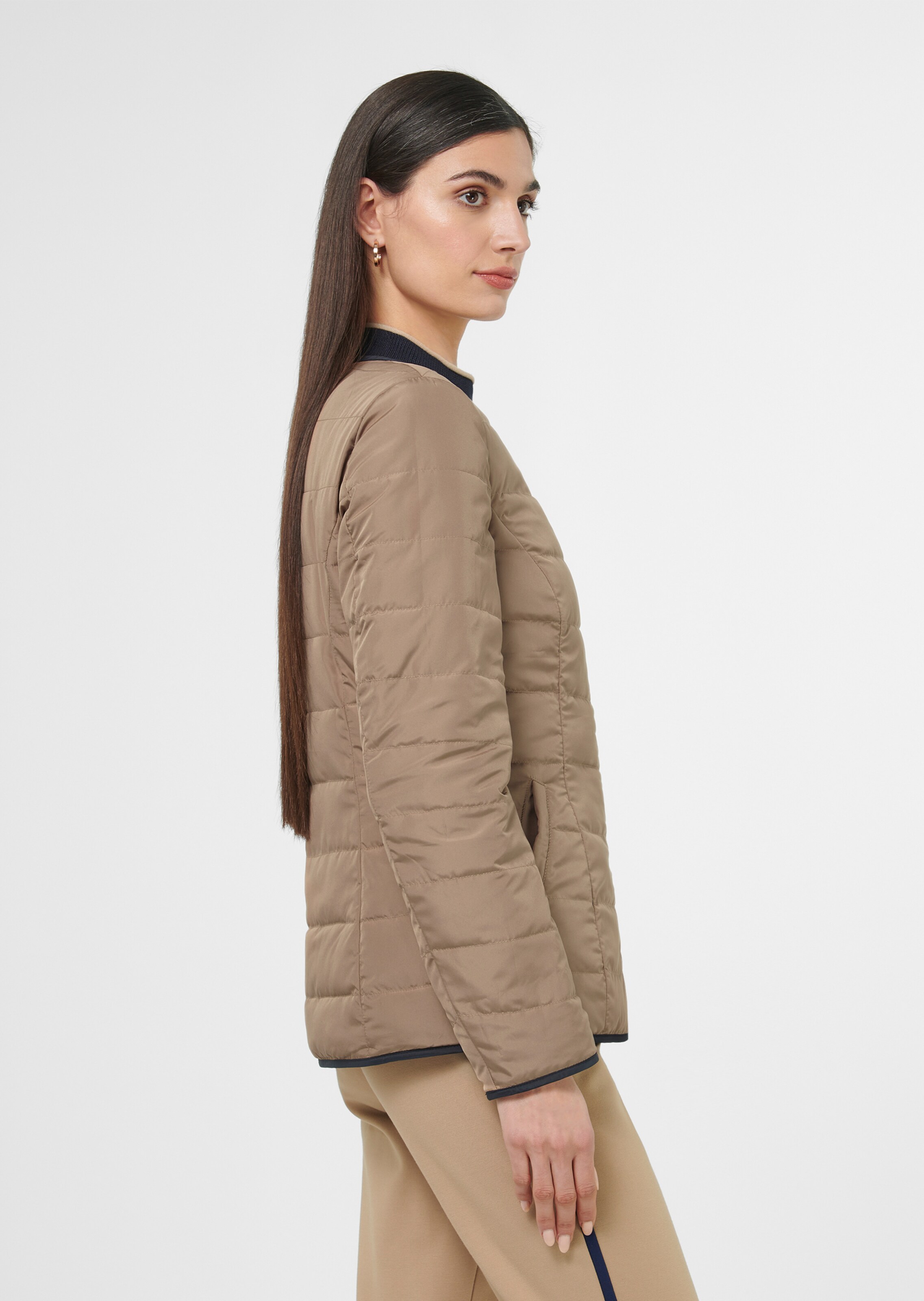 Reversible quilted jacket in navy / caramel | MADELEINE Fashion