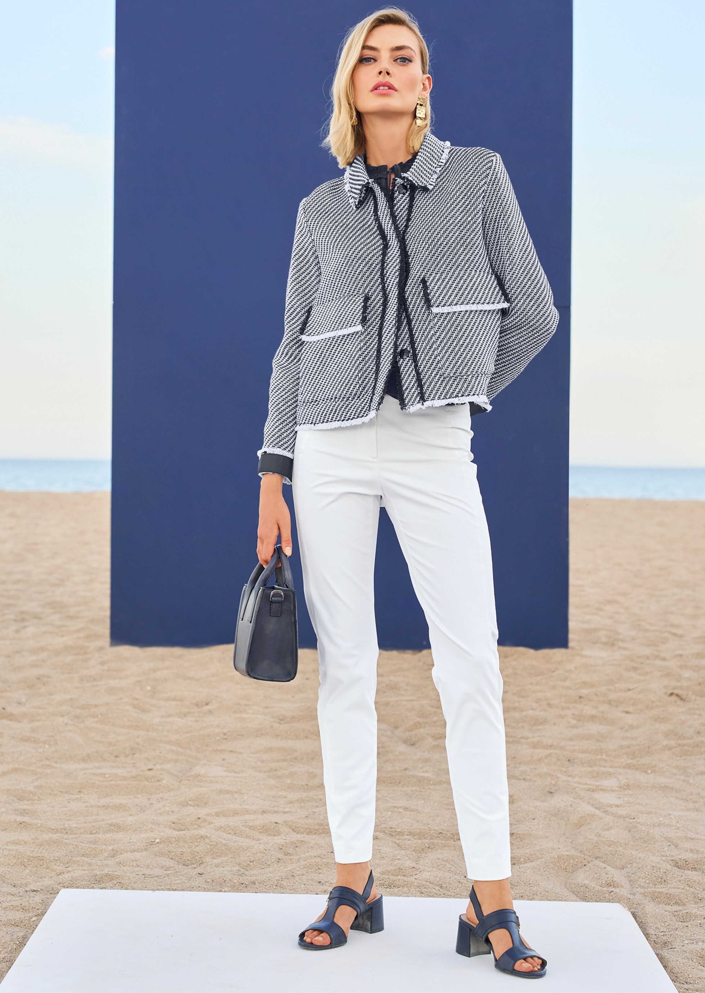 Trousers in natural white | MADELEINE Fashion