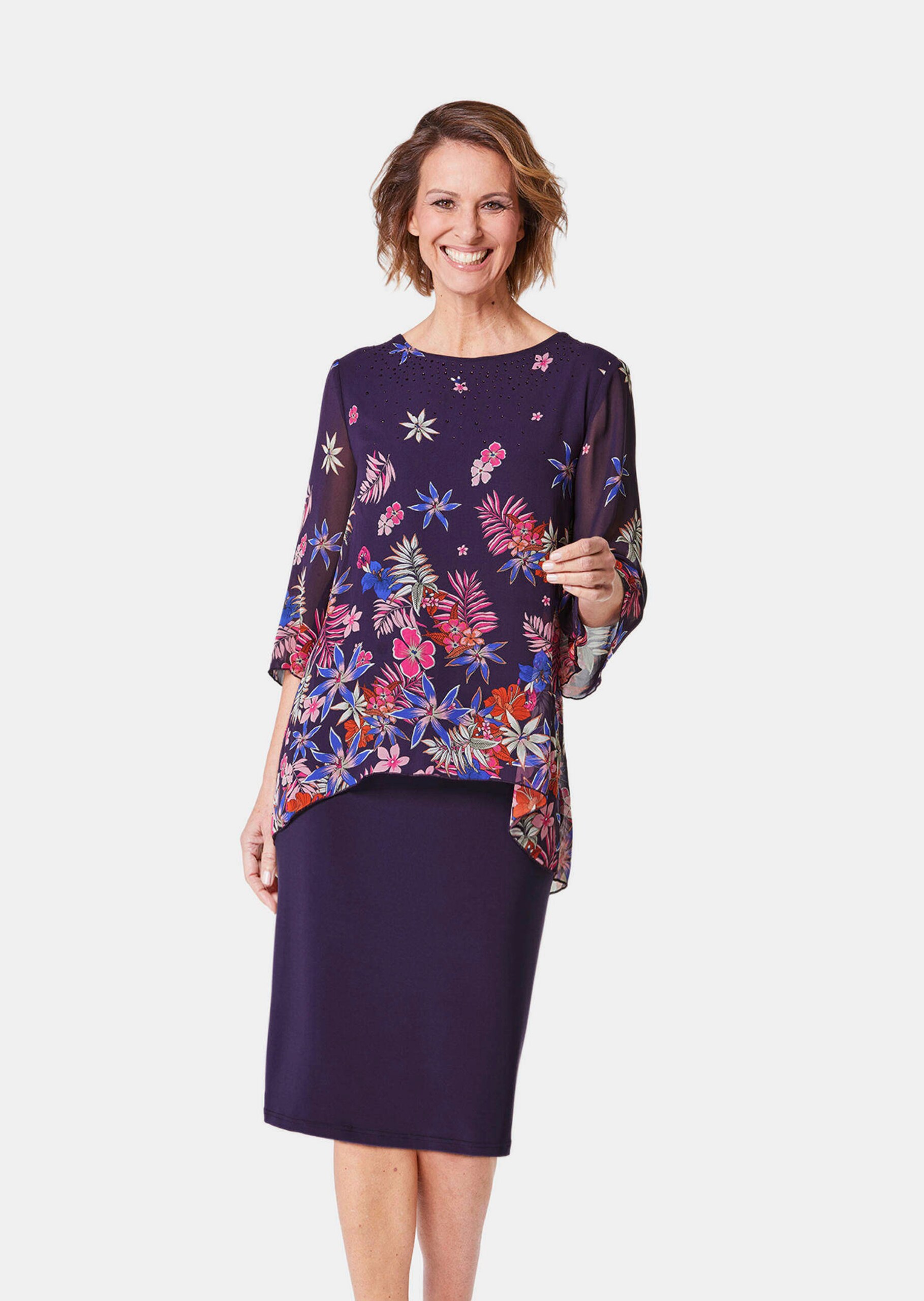 Jurk met gebloemde drapering van chiffon in paars / gedess. | GOLDNER